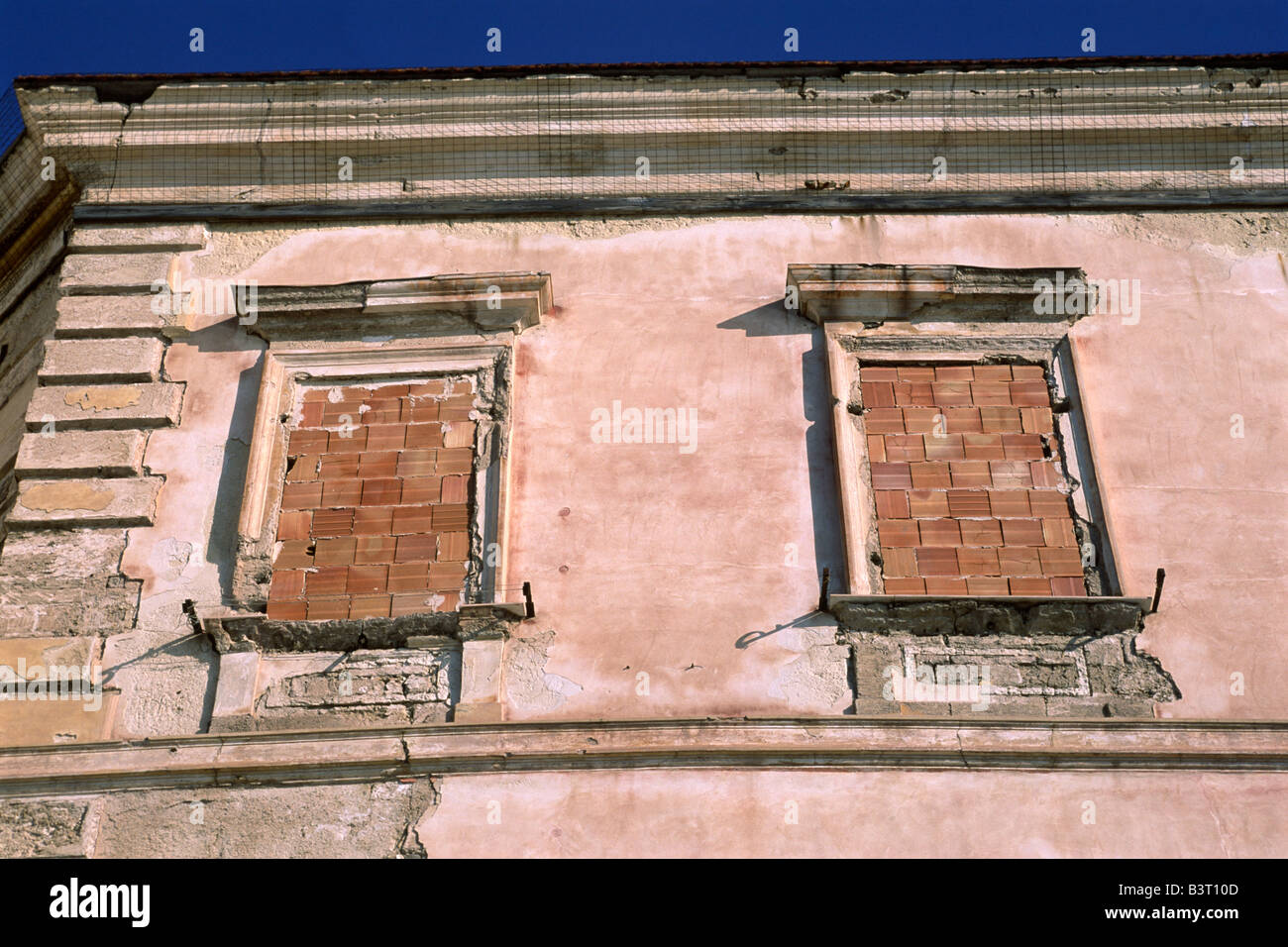 Italy, Puglia, Taranto, derelict house, bricked up windows Stock Photo ...
