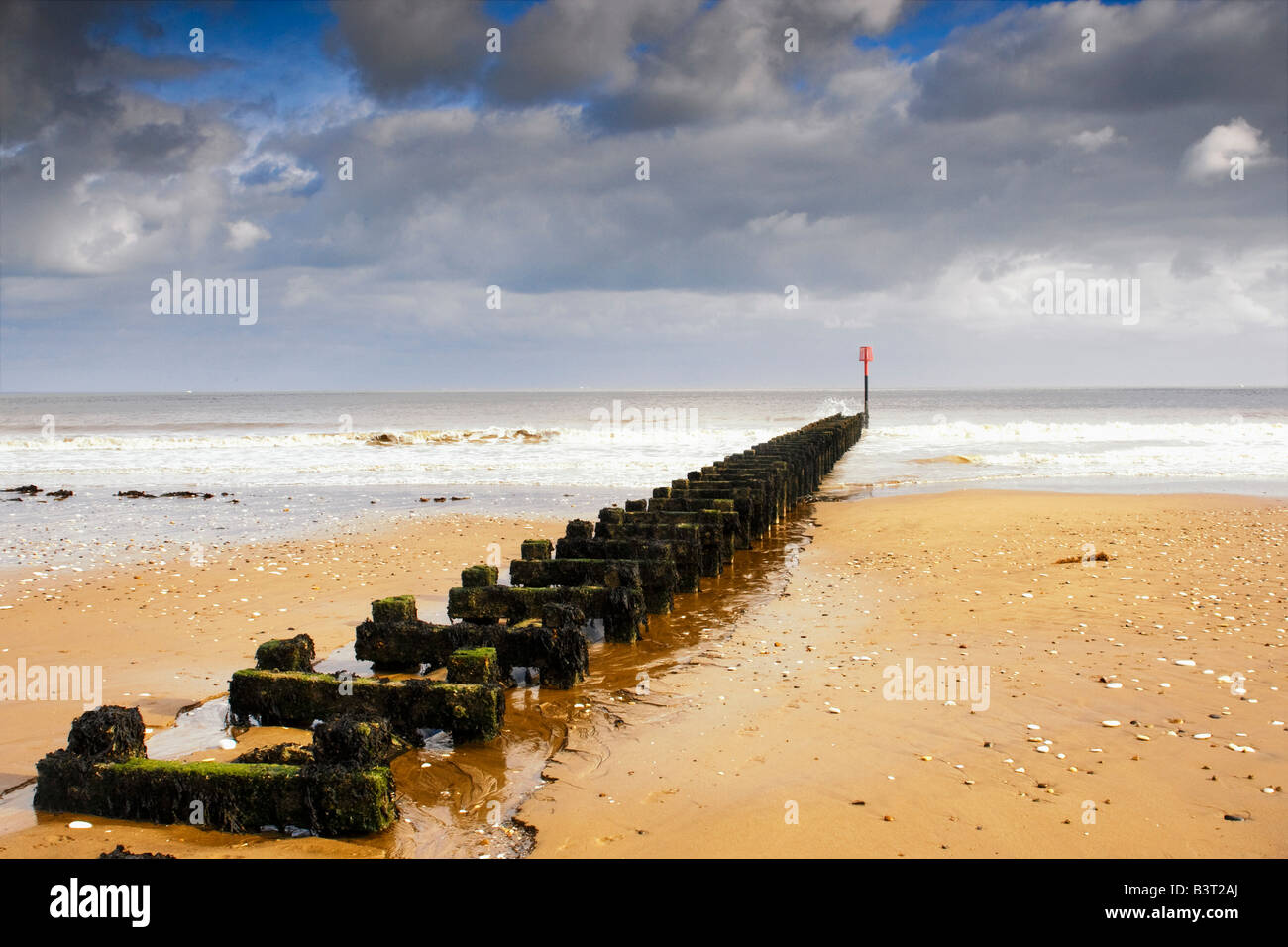 Jetty on beach, Yorkshire, England Stock Photo - Alamy