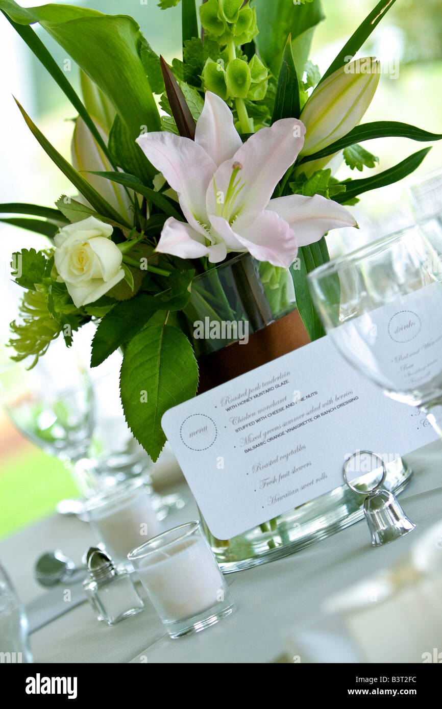 Menu card on table next to flower vase Stock Photo - Alamy