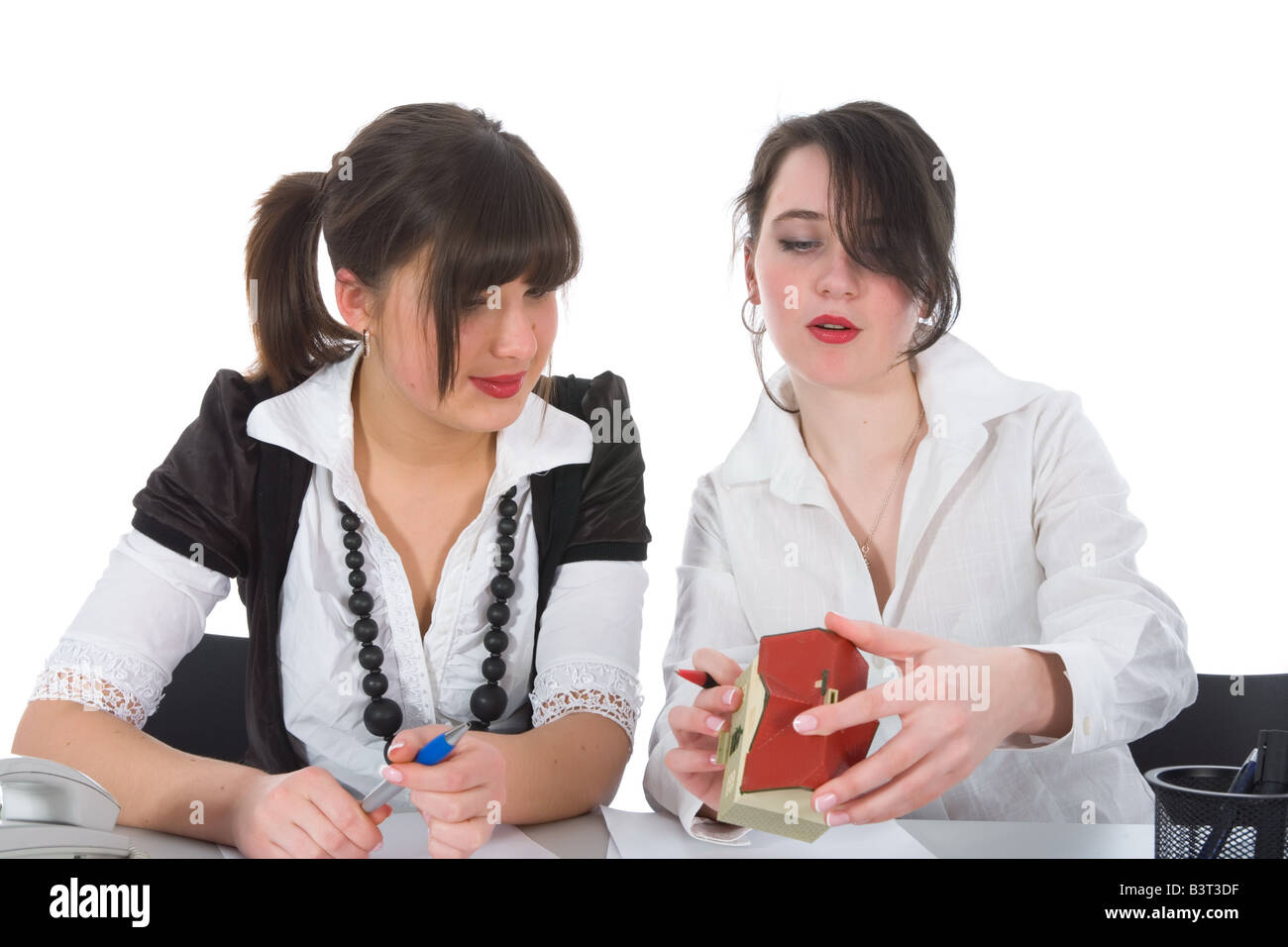 Business woman advertises real estate on white background Stock Photo ...