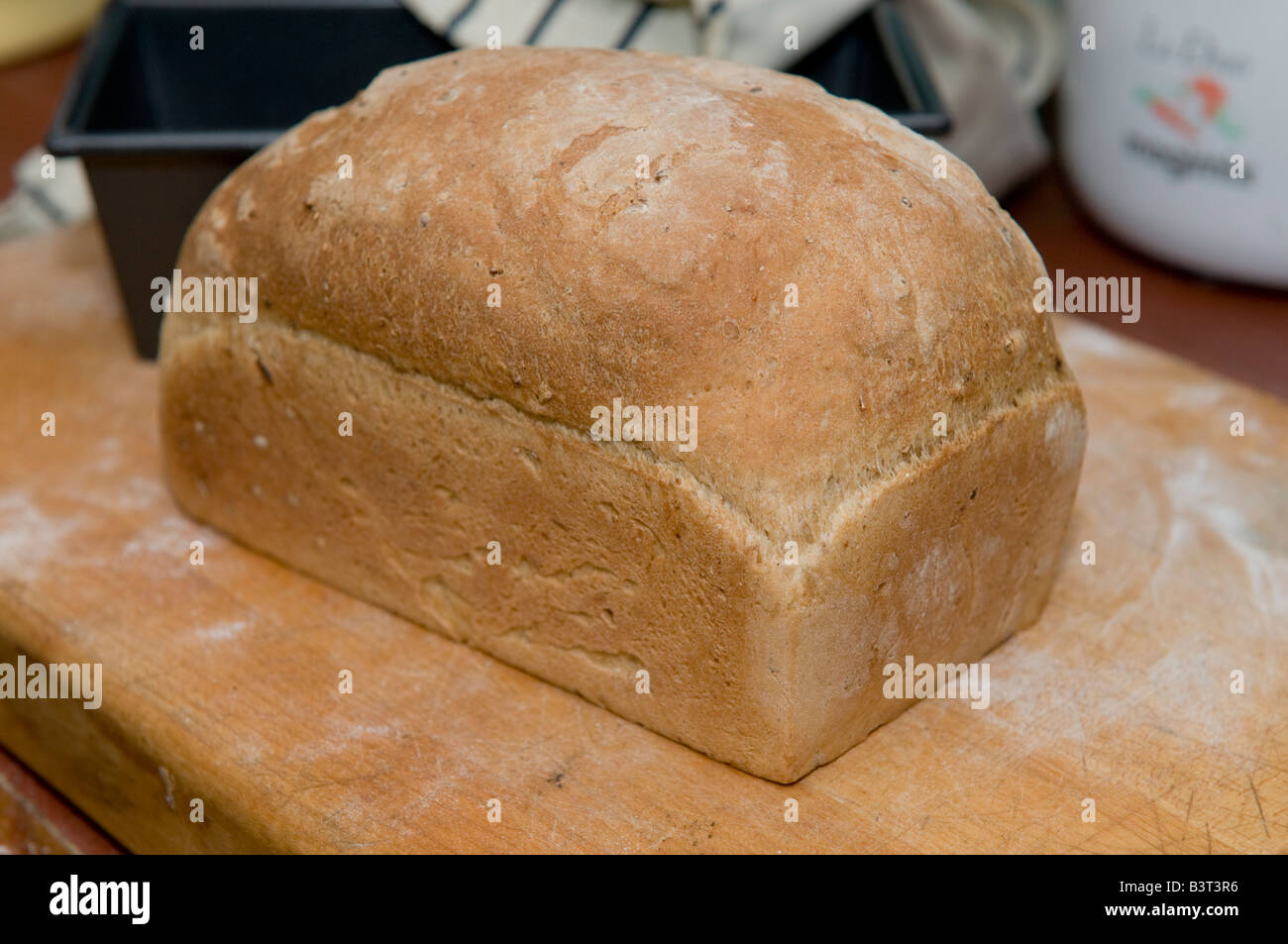 Fresh baked home made loaf of organic bread in kitchen fresh from the ...