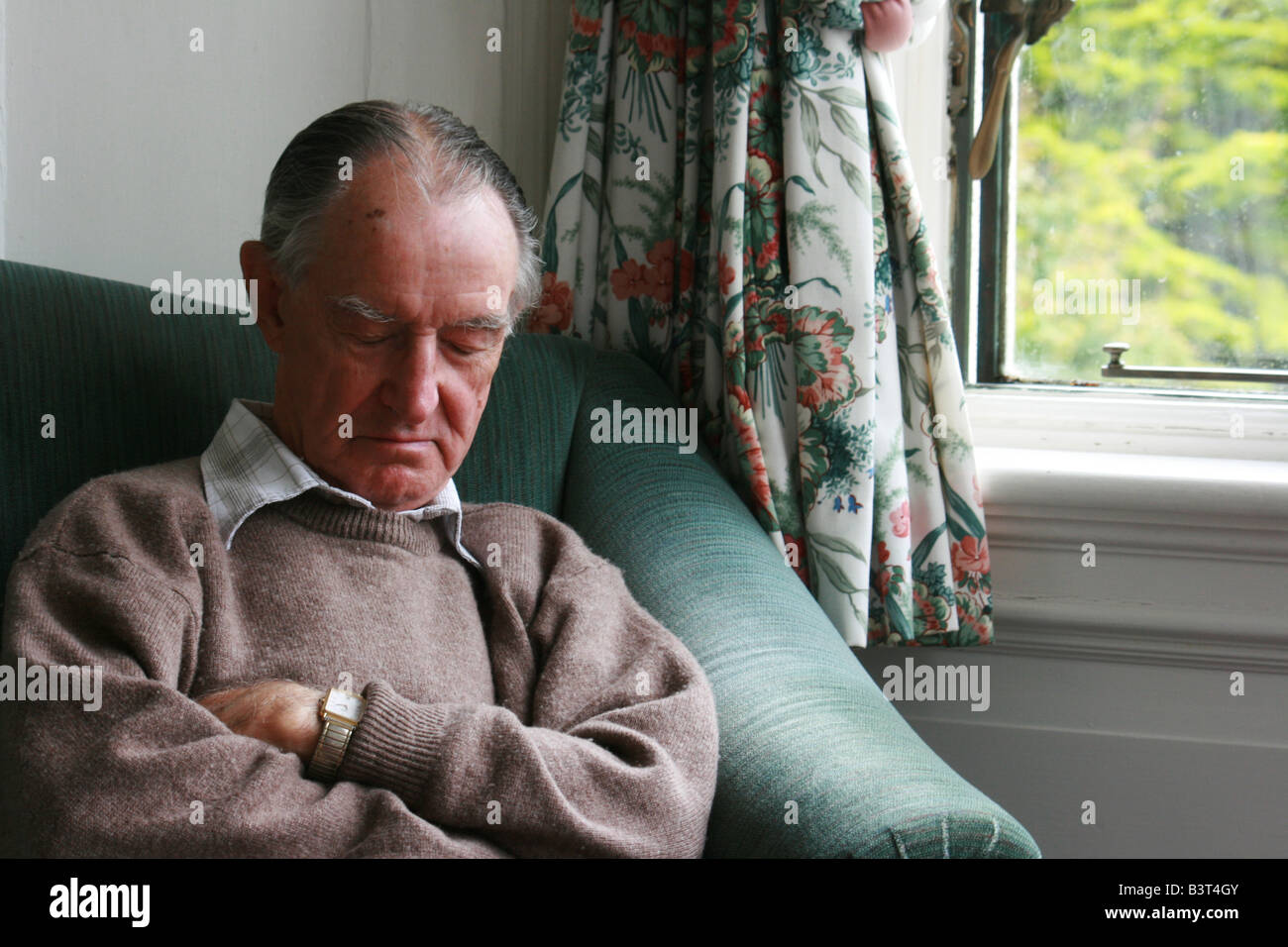 Old man sleeping chair hi-res stock photography and images - Alamy