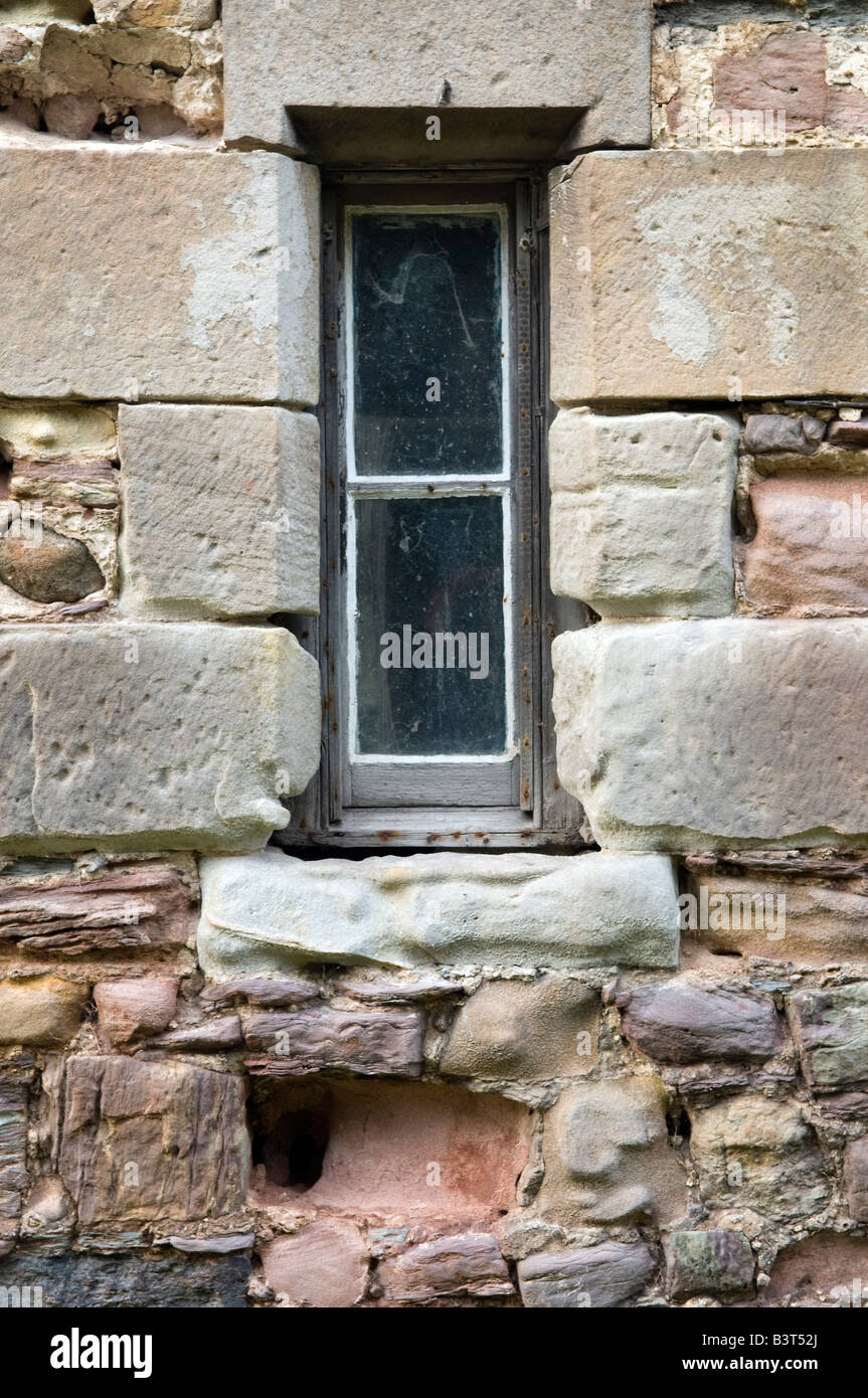 Bad erosion on a sandstone building in Northumberland Great Britain ...