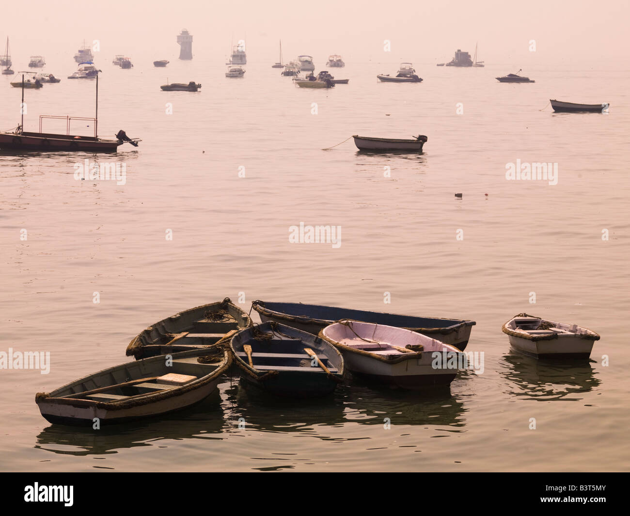 Fishing boats at dawn Stock Photo - Alamy