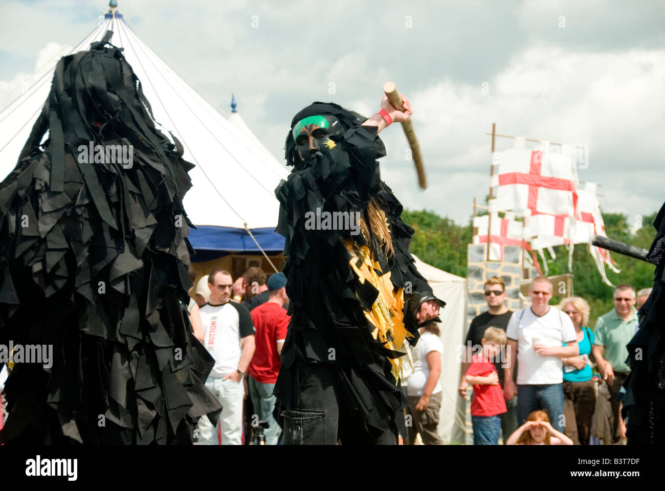 Bedlam Morris Dancers in Black Rag Robes Dance Fight with Sticks in ...