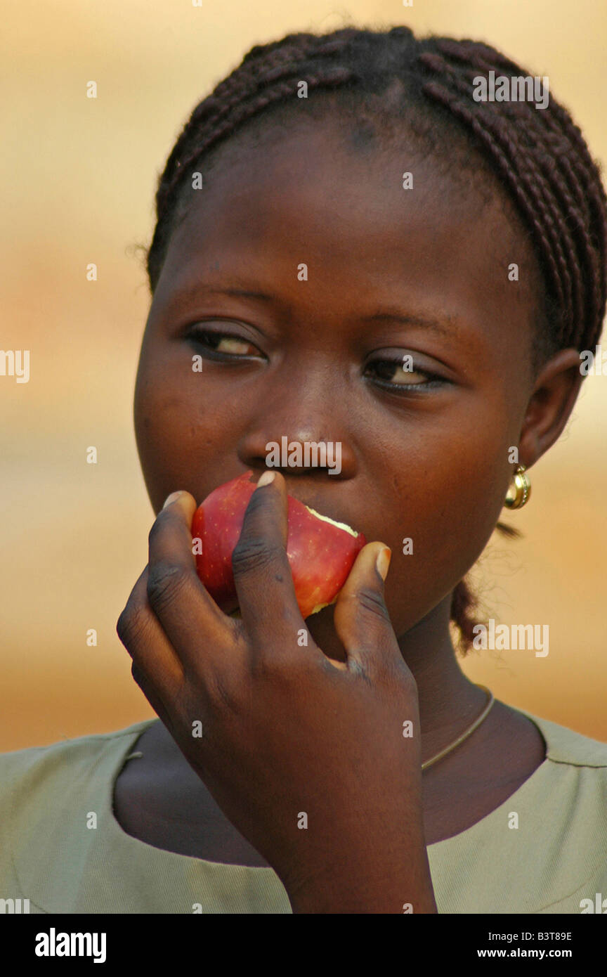 Africa children eating fruit hi-res stock photography and images - Alamy