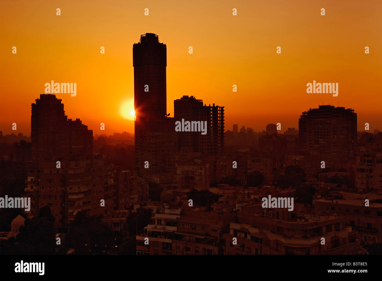 Sunset behind tall apartment building, Cairo, Egypt Stock Photo - Alamy