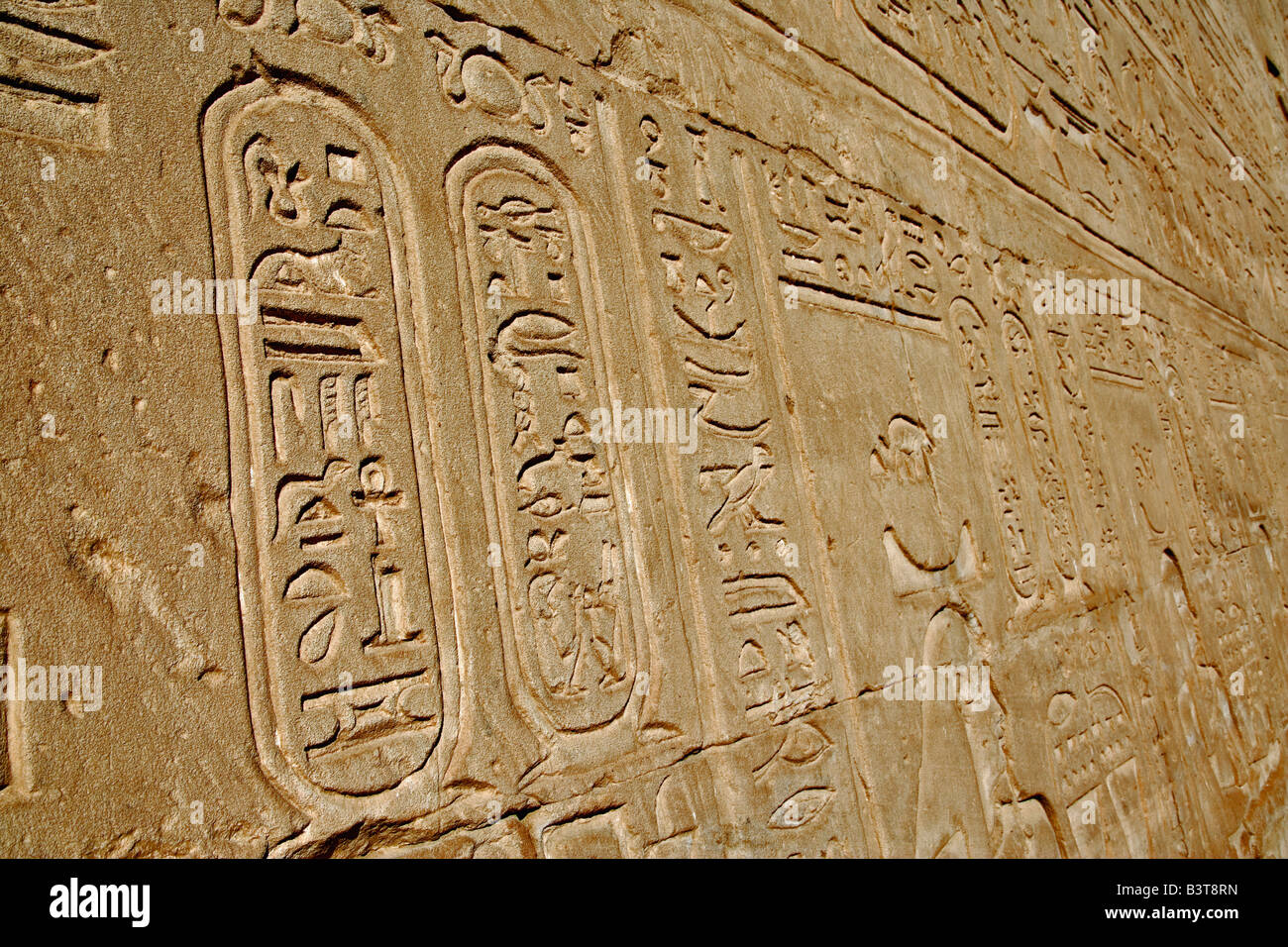 Cartouche and hieroglyph on main pylons of entrance to Temple of Horus ...