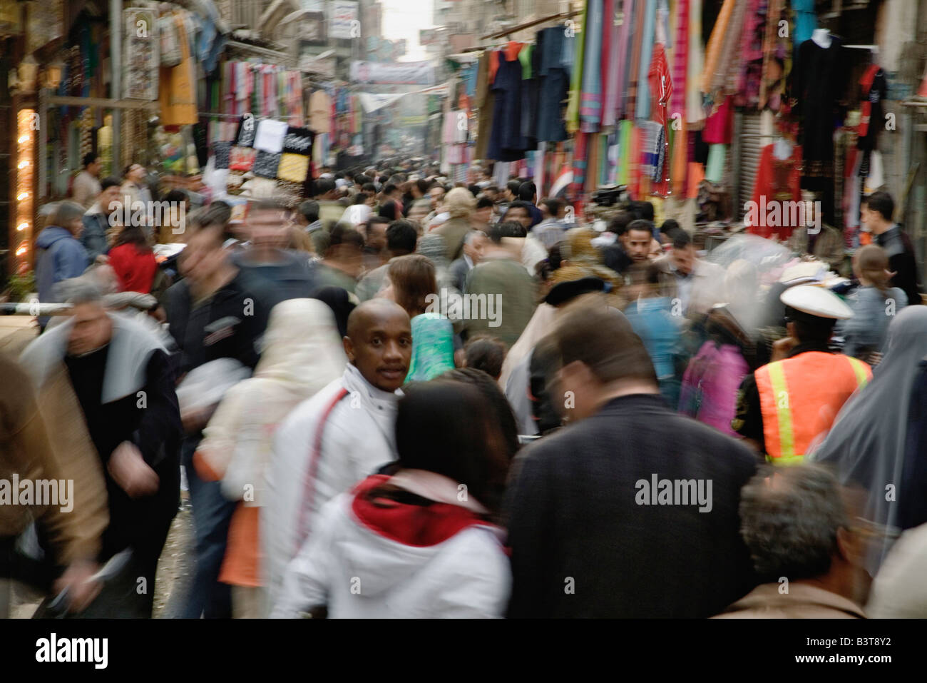 People in motion, crowded street in Khan el Khalili Bazaar, Cairo ...