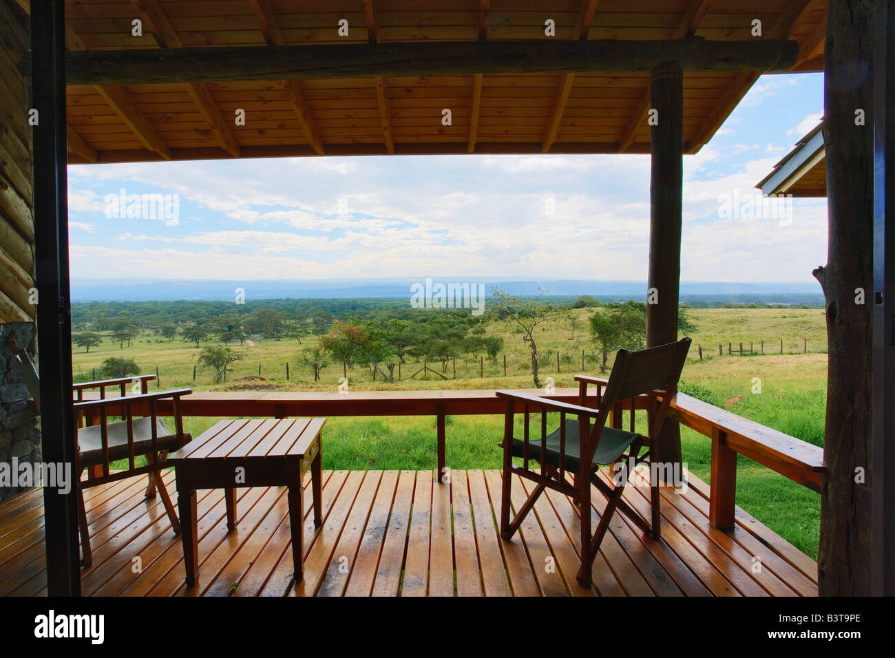 View of acacia forest from porch at safari camp, Lake Nakuru National ...