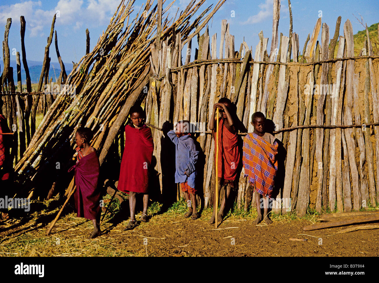 Africa, Kenya, Masai Mara National Wildlife Reserve. Five children next ...