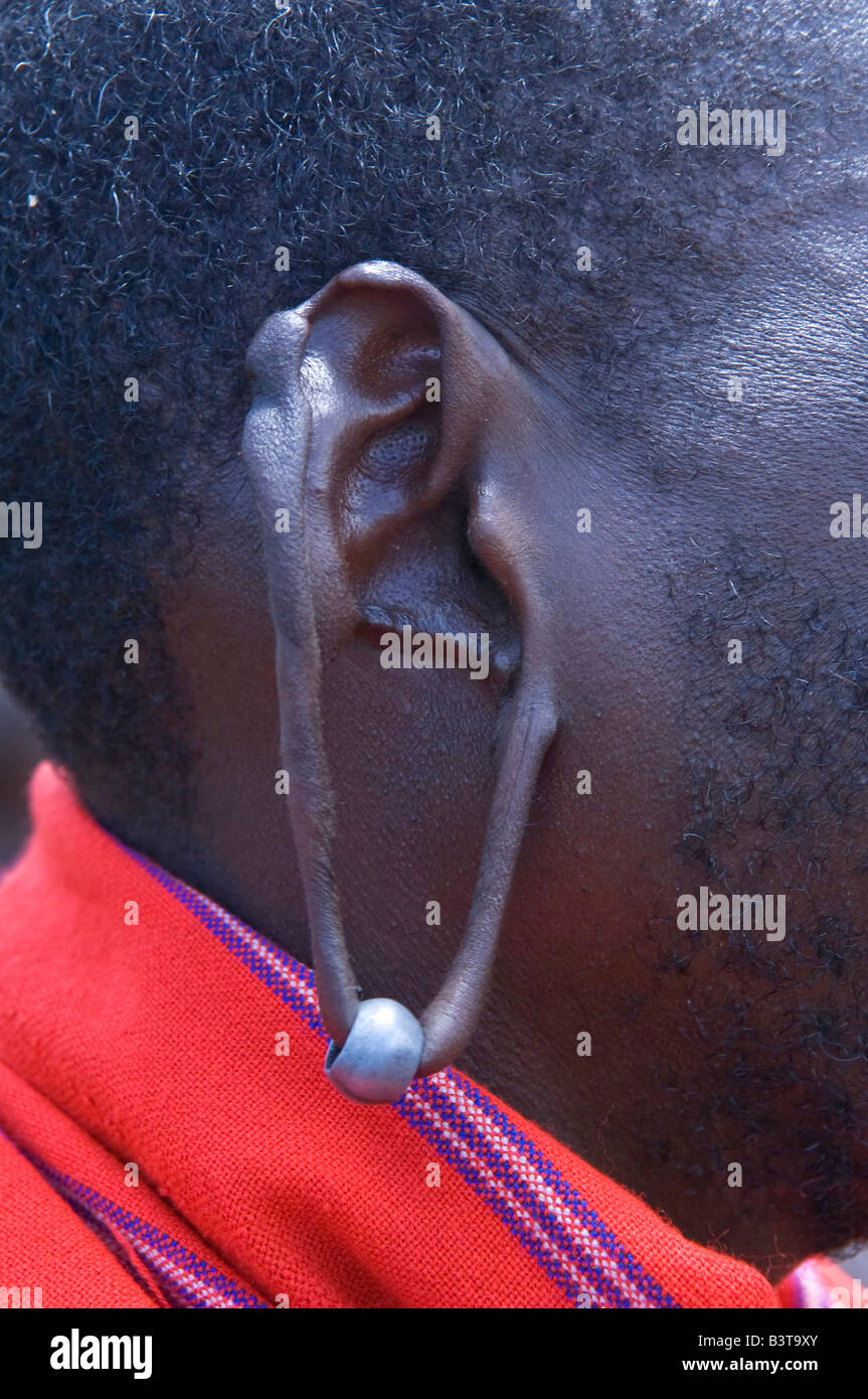 Africa, Kenya, Masai Mara. Close-up of Masai man with elongated ear ...