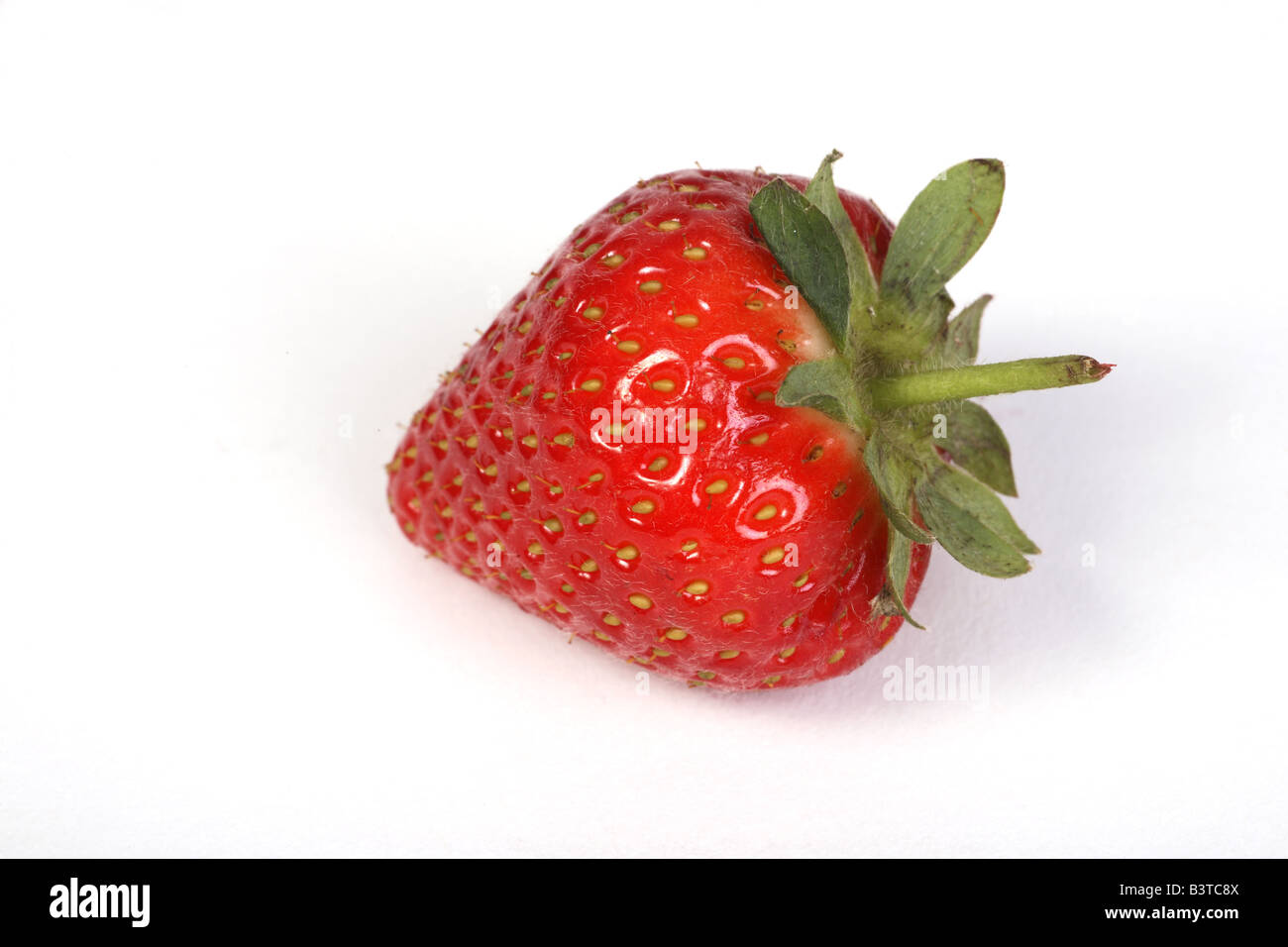 One strawberry Cut Out Stock Images & Pictures - Alamy