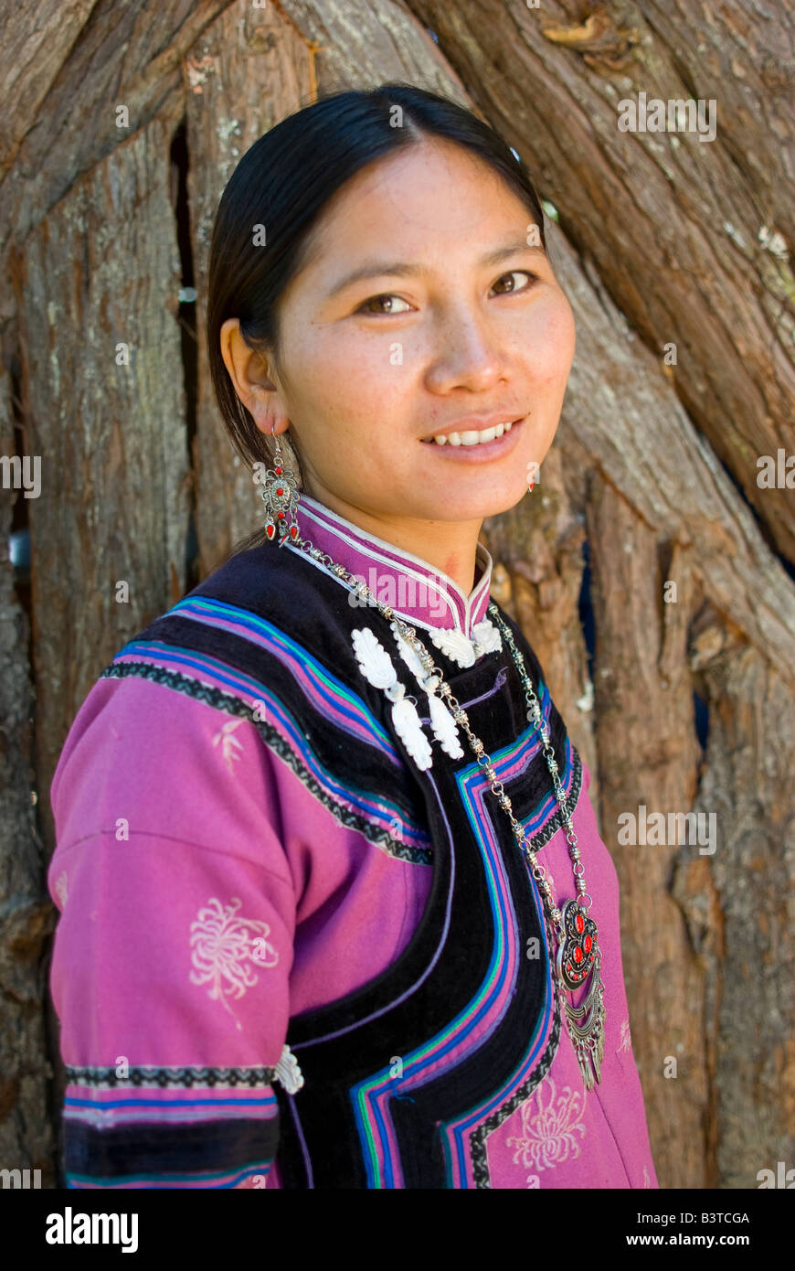 Asia, China, Yunnan Province, Yuanyang. Portrait of young Hani minority ...