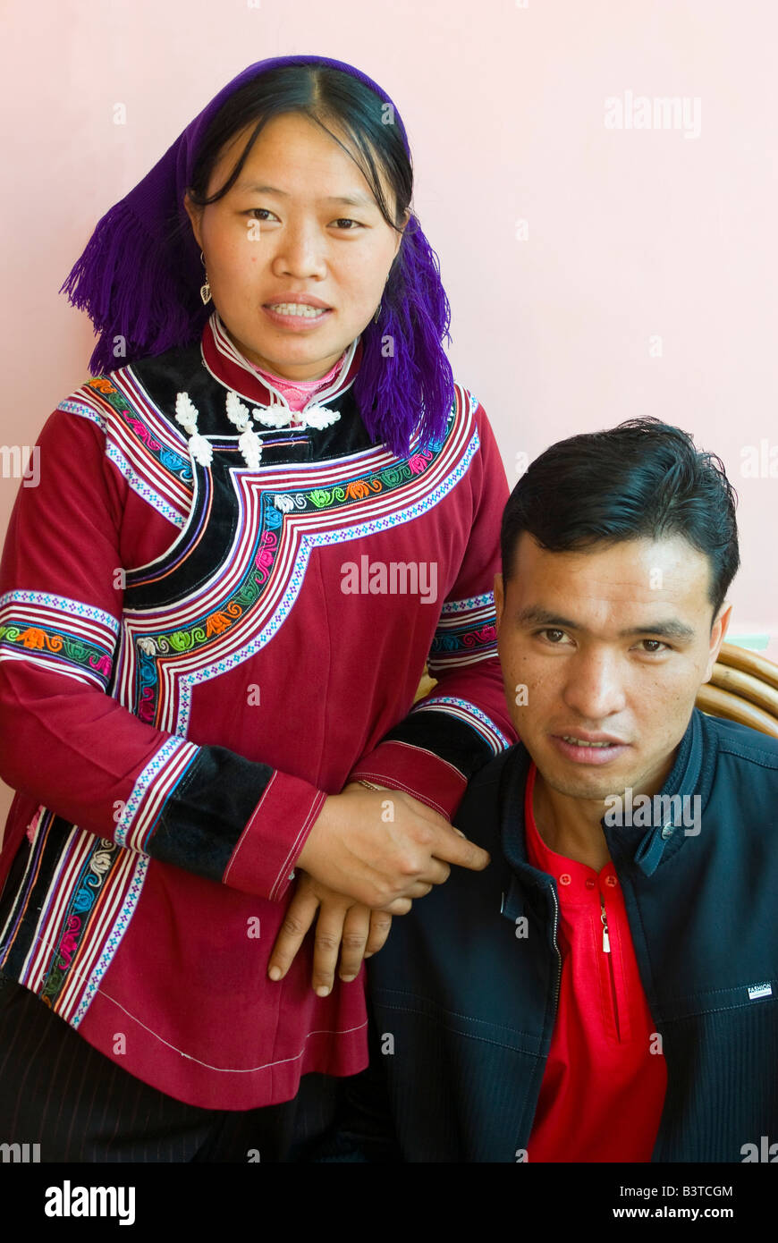 Asia, China, Yunnan Province, Yuanyang. Portrait of young Hani minority ...