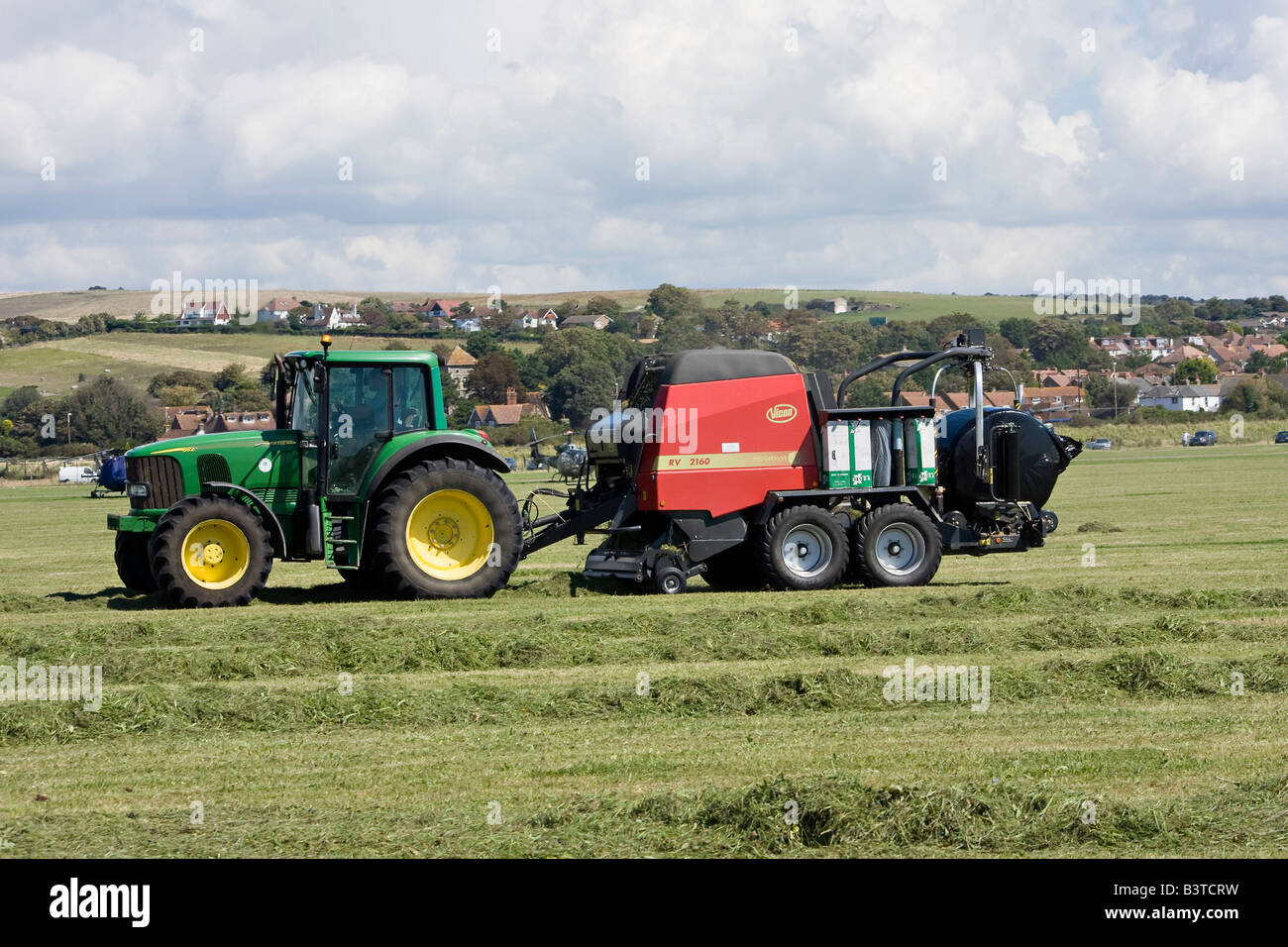 Vicon RV 2160 variable chamber baler in use at Shoreham Airport Sussex ...