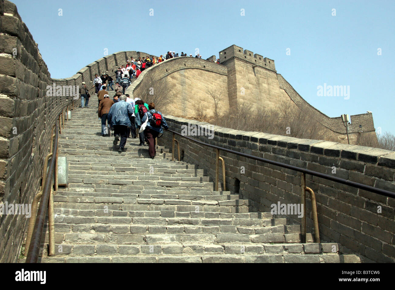 Asia, China, Beijing. Visitors climbing steps at the Great Wall Stock ...