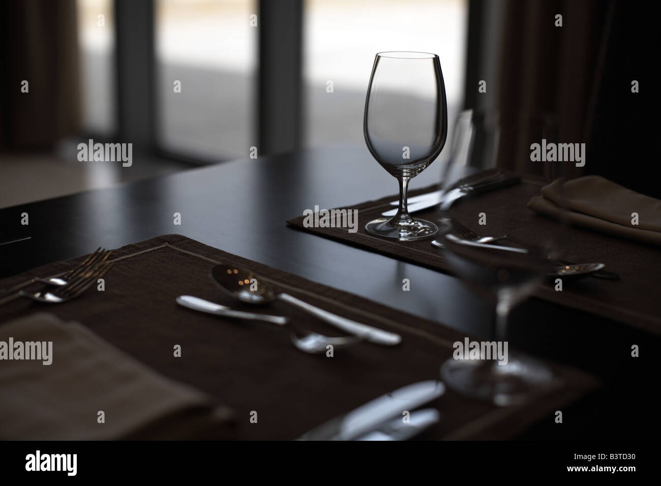 Set dinner table Stock Photo - Alamy