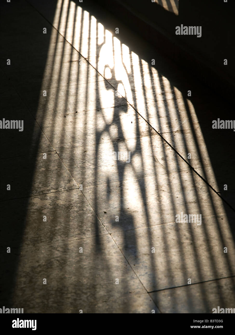 High contrast shadow cast by an ornate railing Stock Photo - Alamy