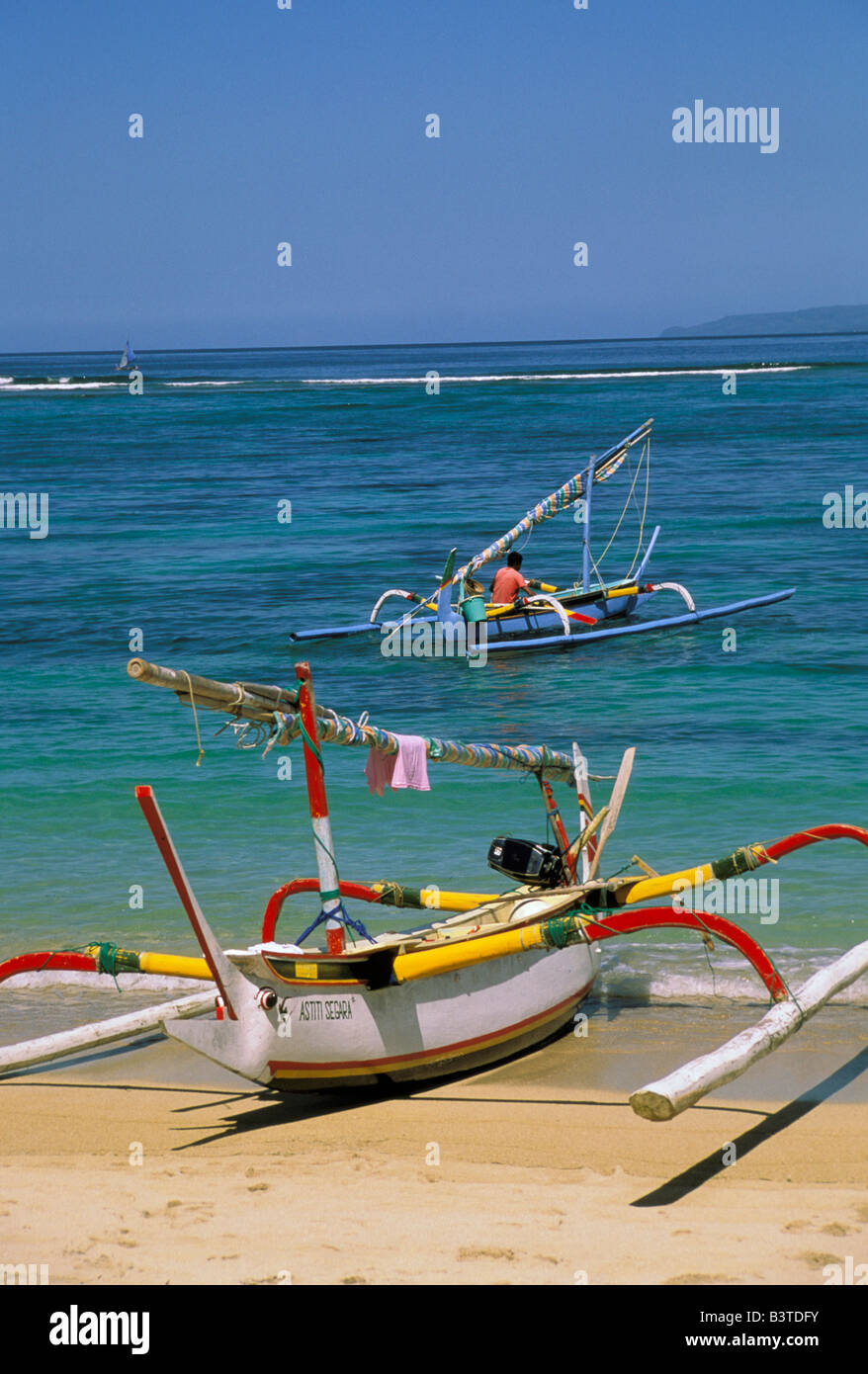 Oceania, Indonesia, Bali. Outriggers Stock Photo - Alamy
