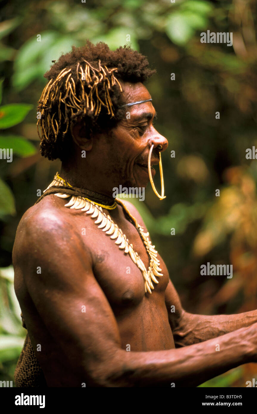 Oceania, Indonesia, Irian Jaya. Man of the Korowai tribe Stock Photo ...