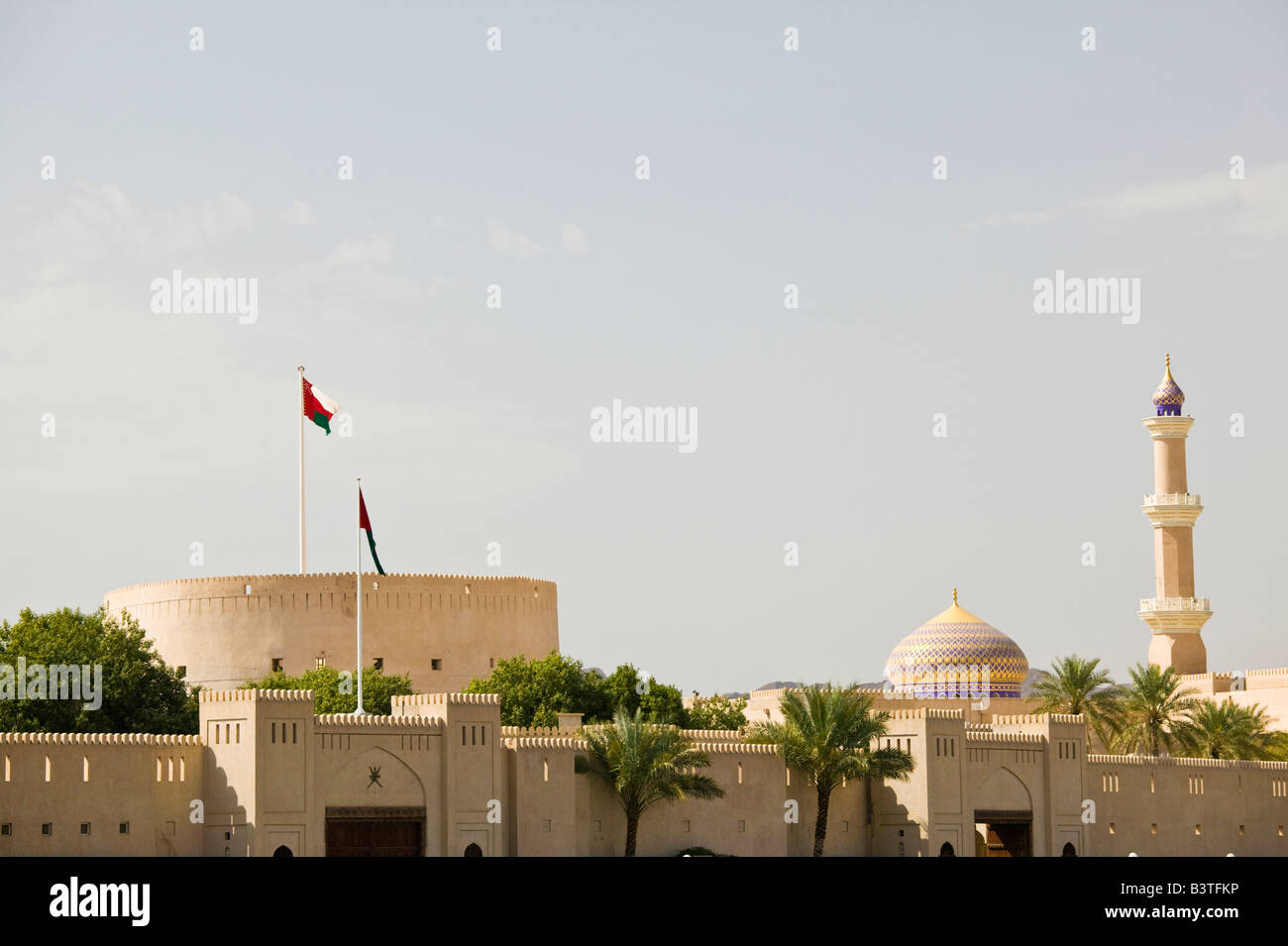 Oman, Western Hajar Mountains, Nizwa. View of Nizwa Fort and Souk Stock ...