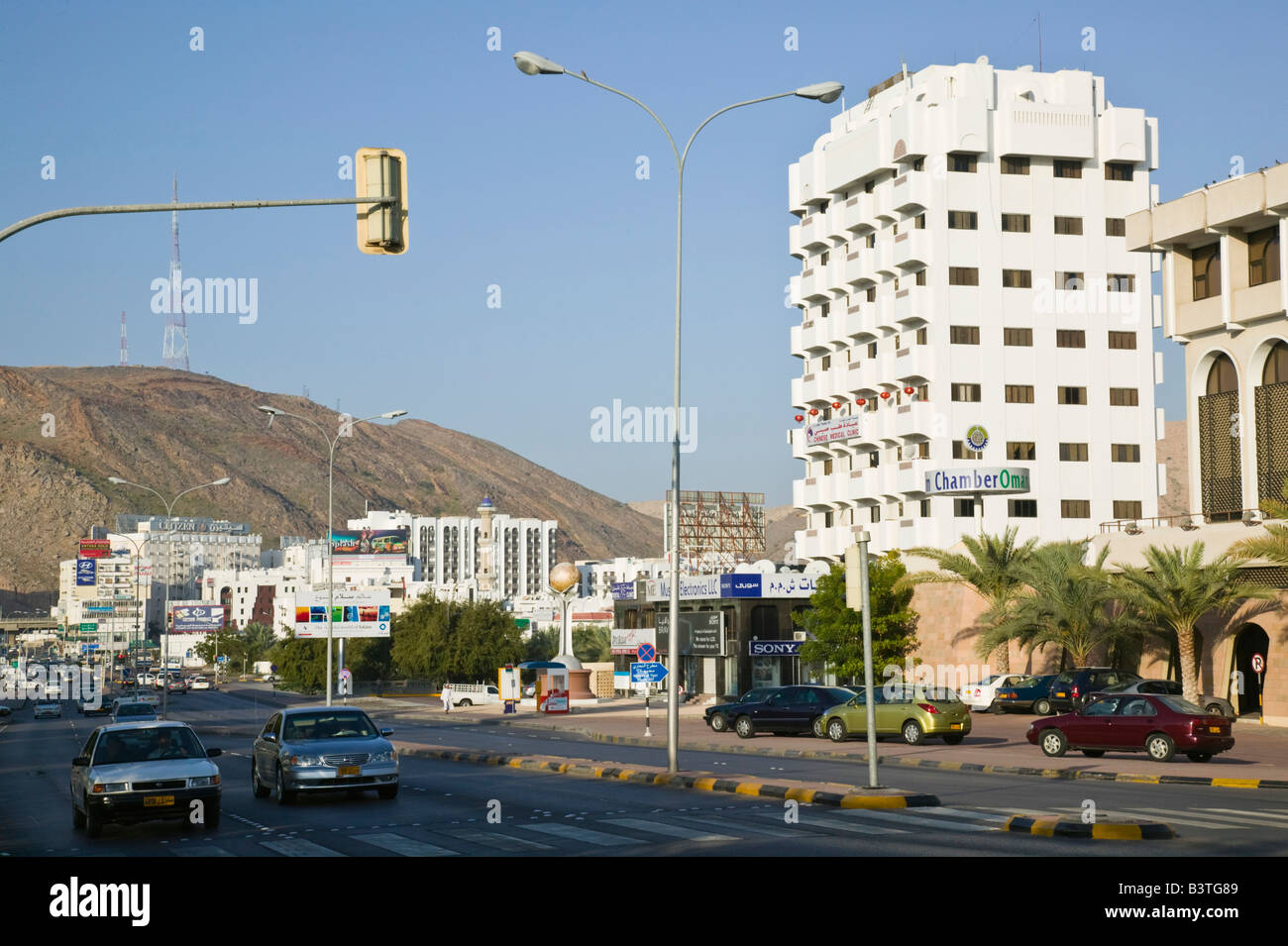 Oman, Muscat, Ruwi. Ruwi Commercial District, Morning Traffic on Al ...