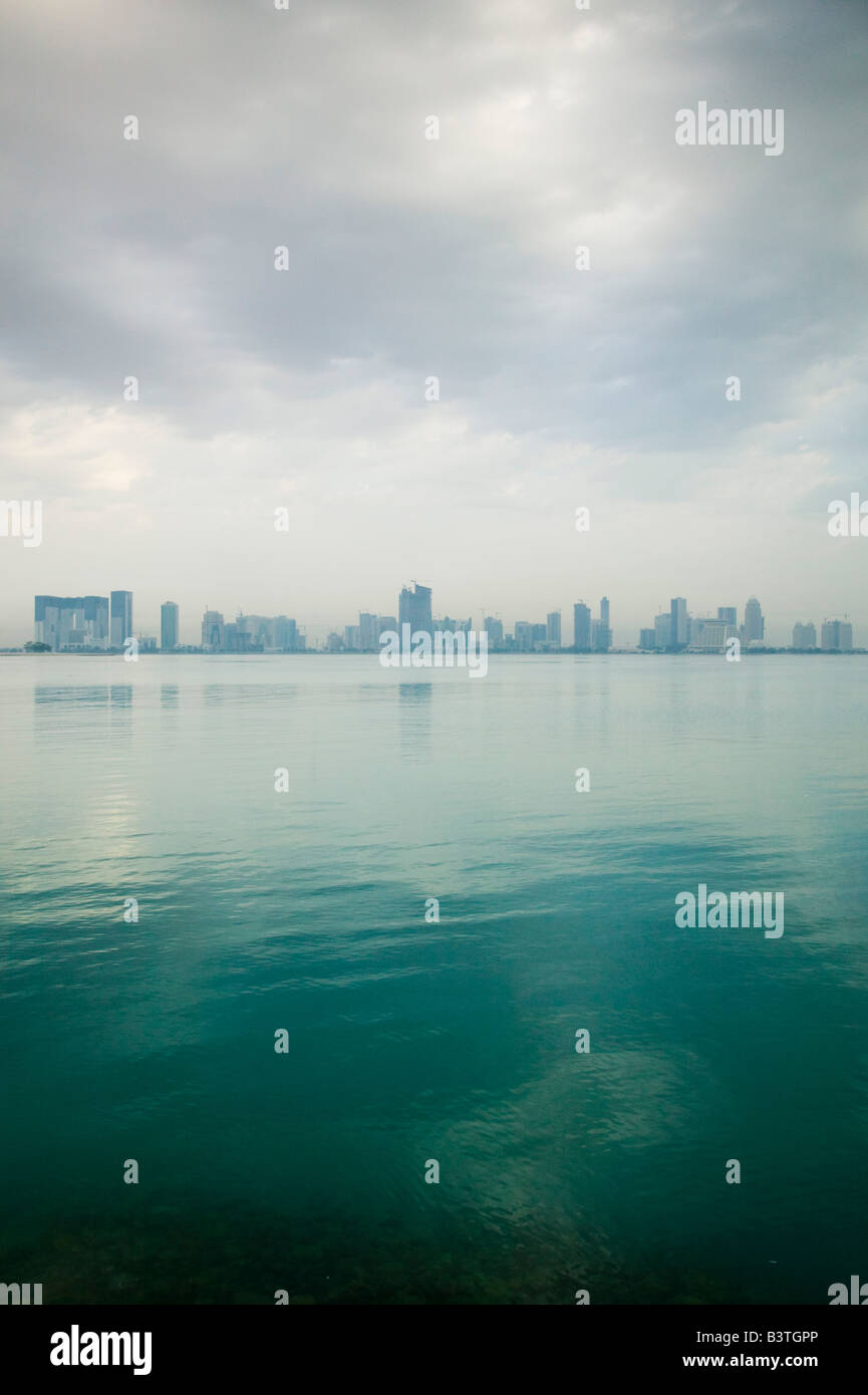 Qatar, Ad Dawhah, Doha. Dawn View of West Bay area across Doha Bay ...