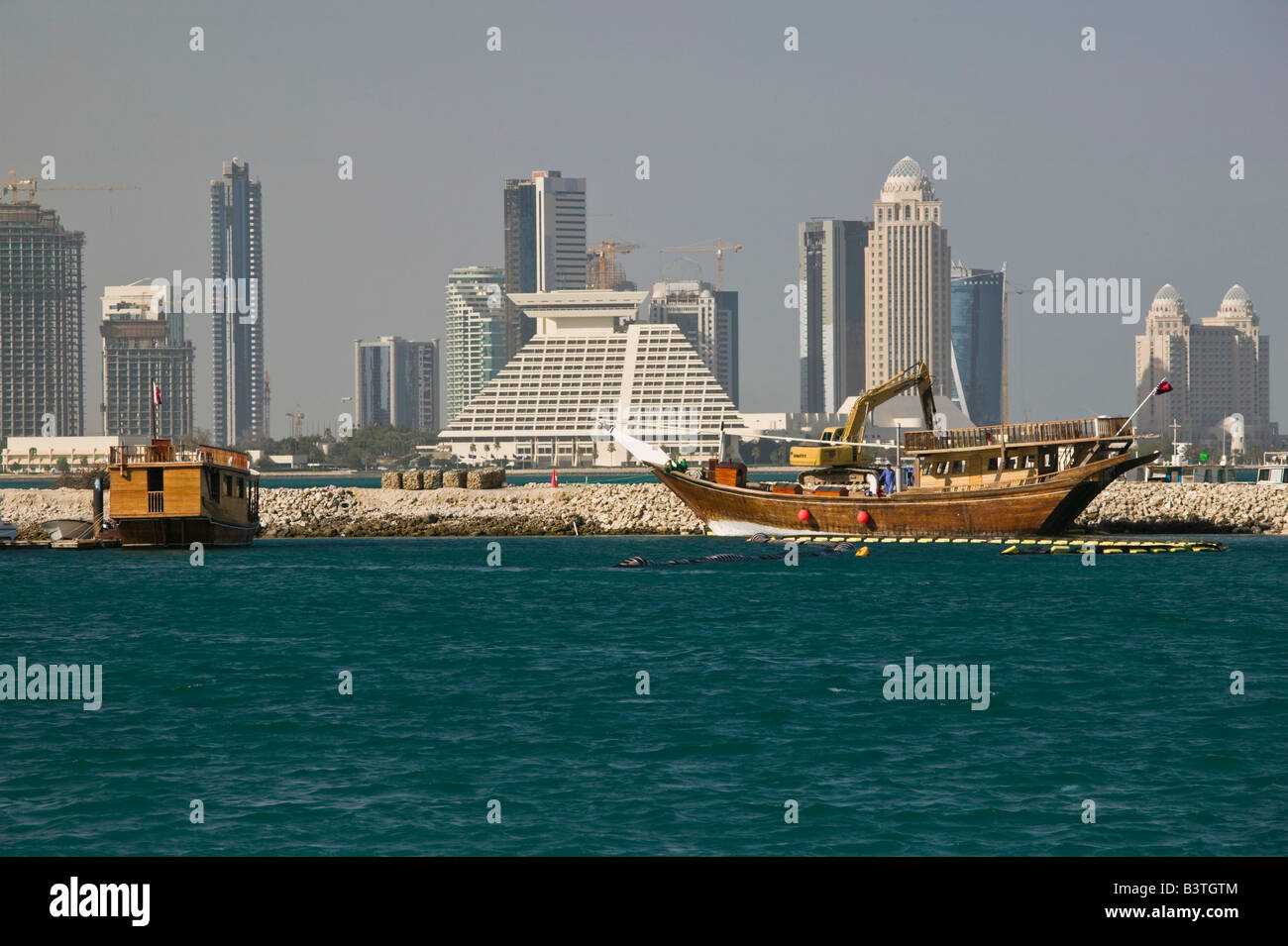 Qatar, Ad Dawhah, Doha. Dhow Harbor- View towards West Bay Stock Photo ...