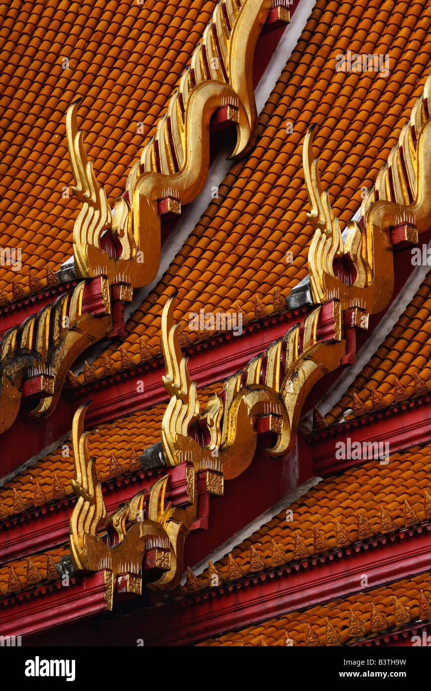 Ornate rooftop architecture of the Ordination Hall (Ubosot Hall) at Wat ...