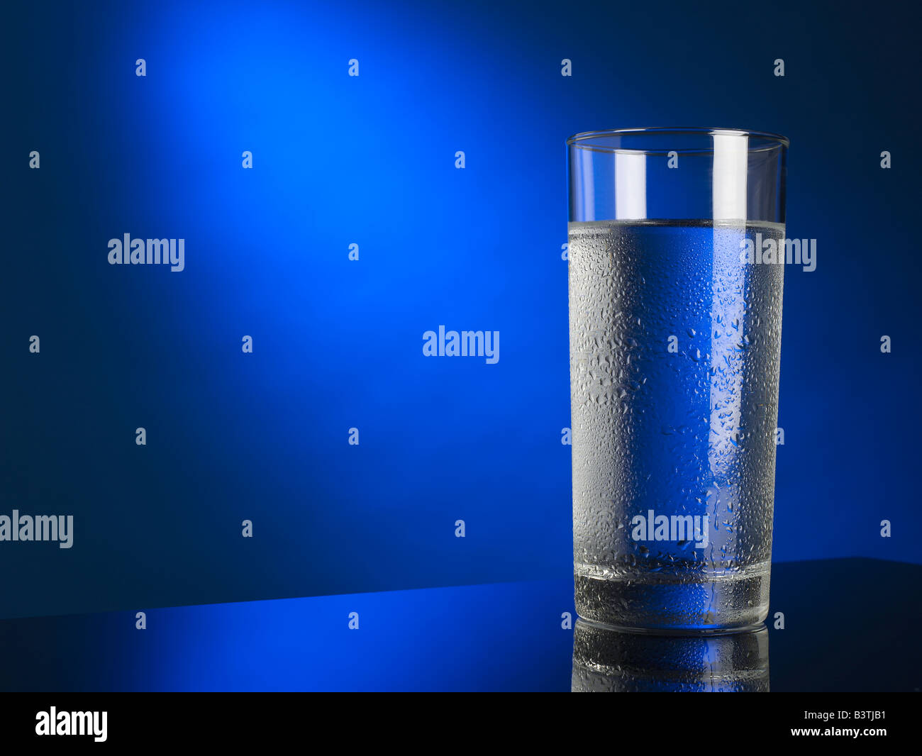 Glass of water horizontal Stock Photo - Alamy