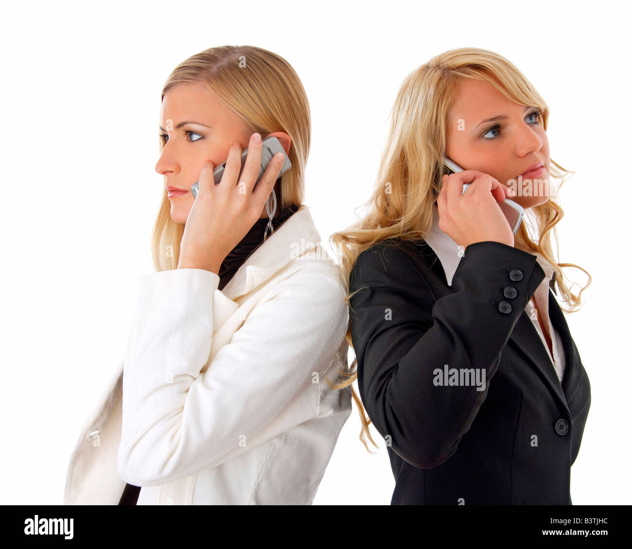 Two women with mobile phone Stock Photo - Alamy