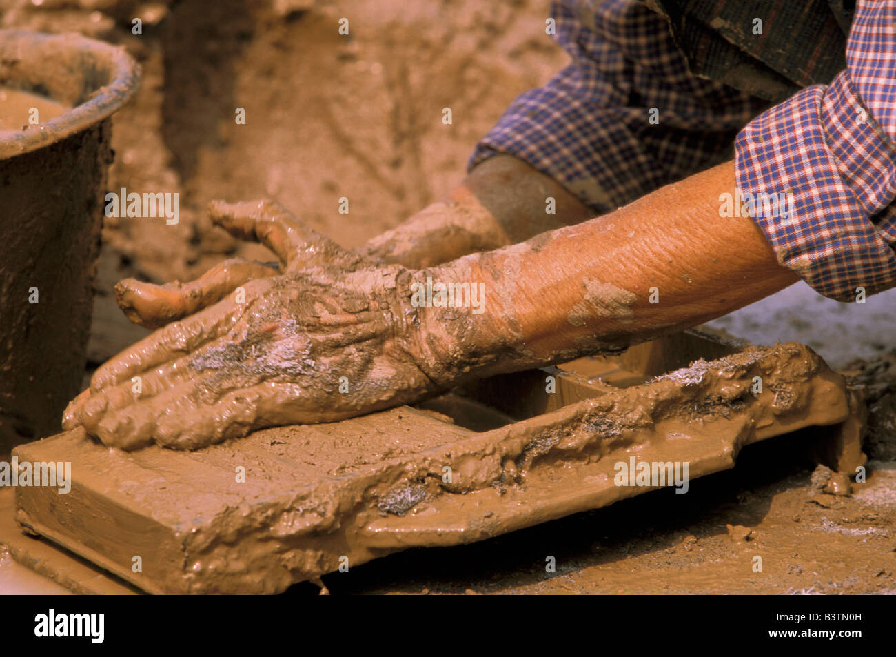 Brick maker hi-res stock photography and images - Alamy