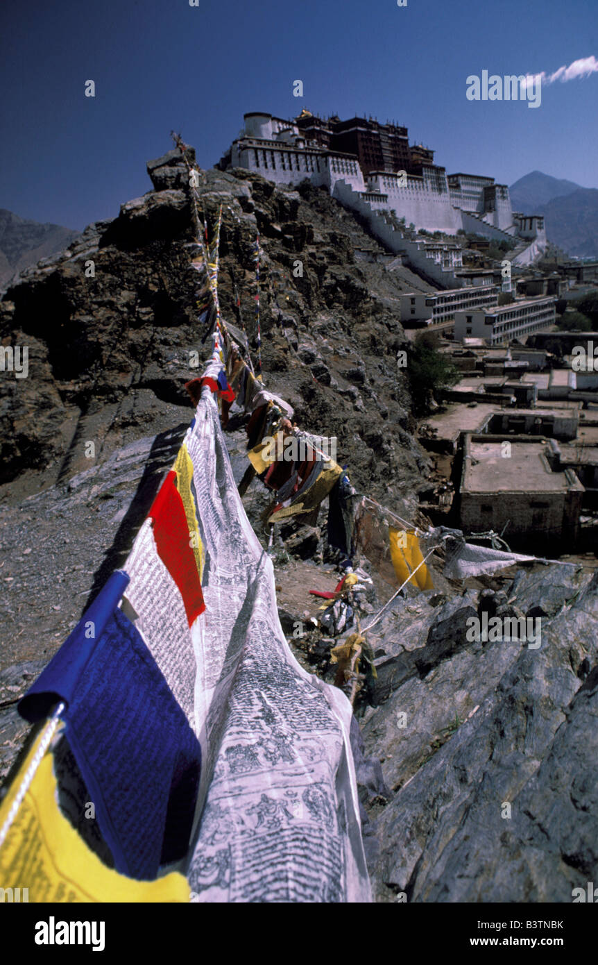 Tibet, Lhasa. Potala Palace and prayer flags Stock Photo - Alamy