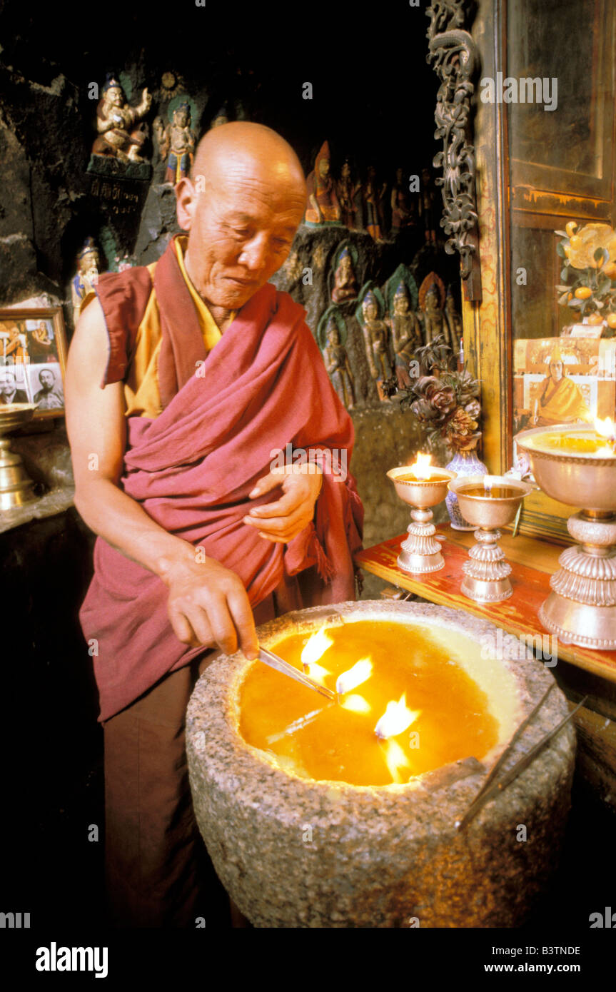 Tibet, Lhasa. Lama, in cave temple Stock Photo - Alamy