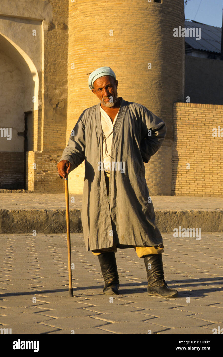 Traditional dressed Uzbek man Old Town Bukhara, Uzbekistan, Central ...