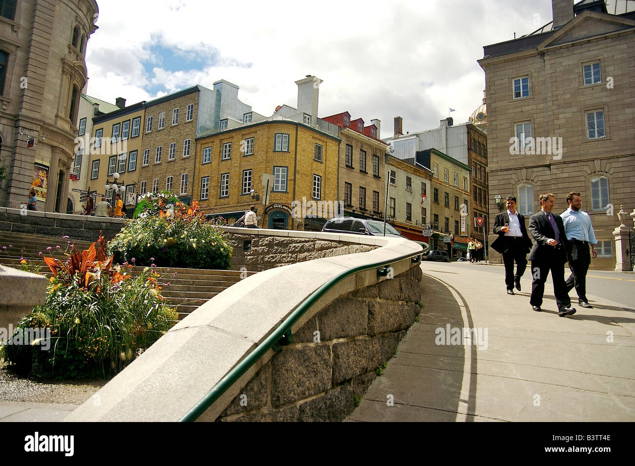 North America, Canada, Quebec, Old Quebec City. Three men walking with ...