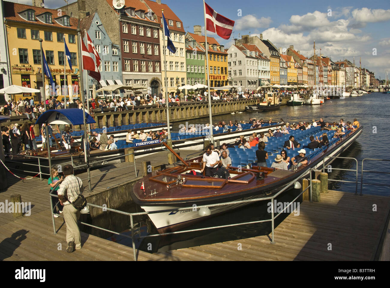 Europe, Denmark, Copenhagen, tour boats at Nyhavn Canal dock Stock ...