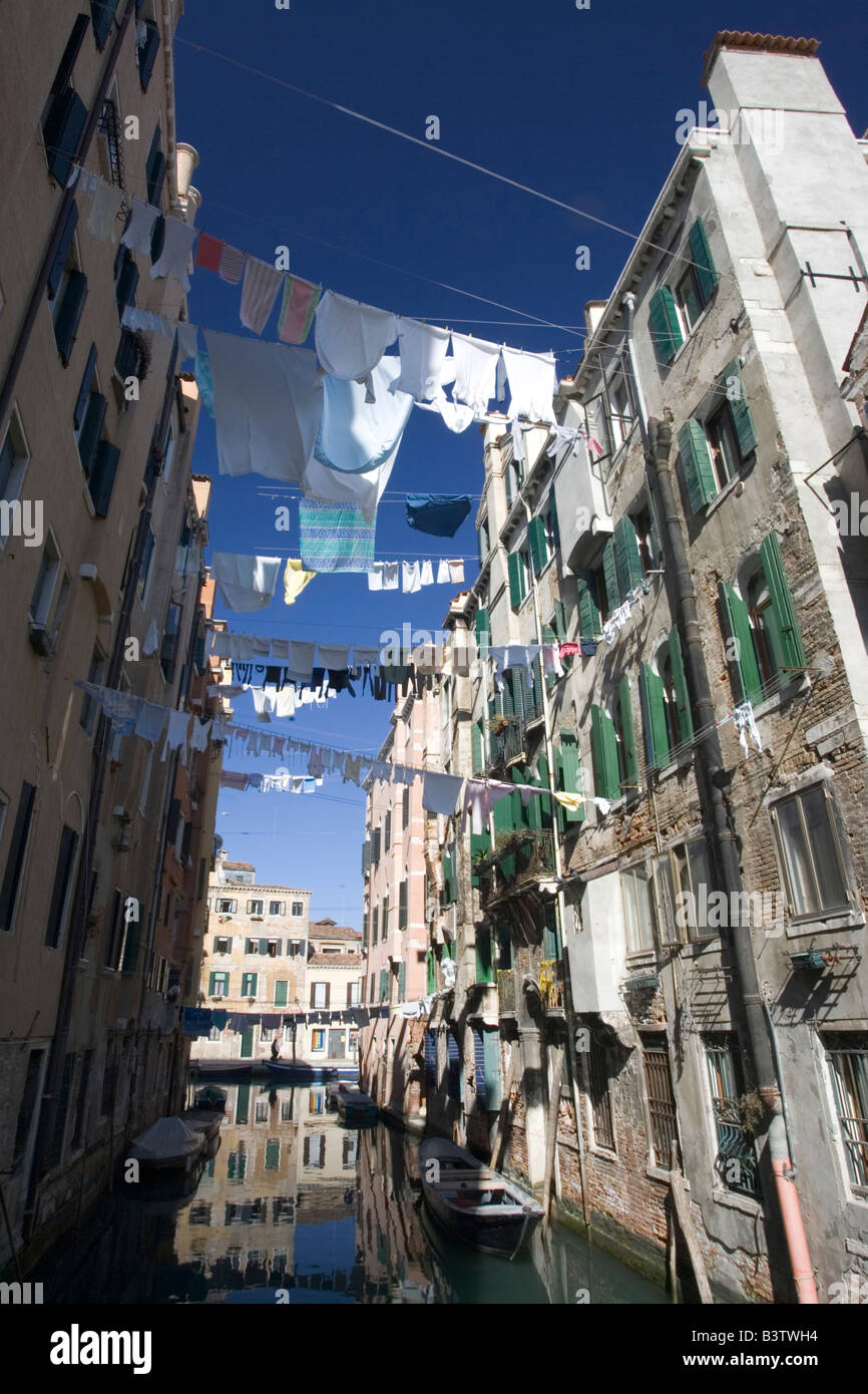 Europe, Italy, Venice. Laundry strung between buildings in the Ghetto ...