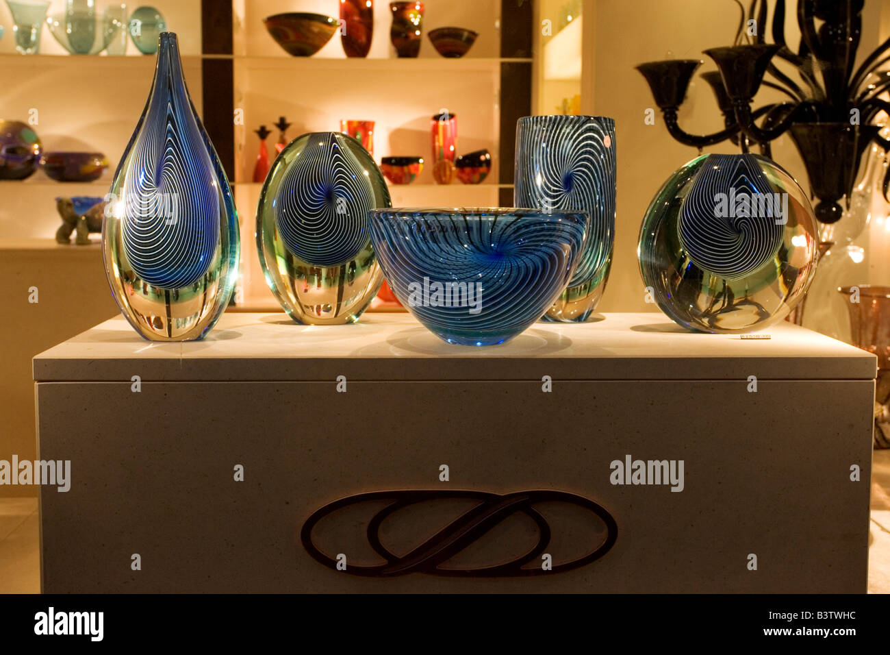 Europe, Italy, Venice. Nighttime window display for store selling ...