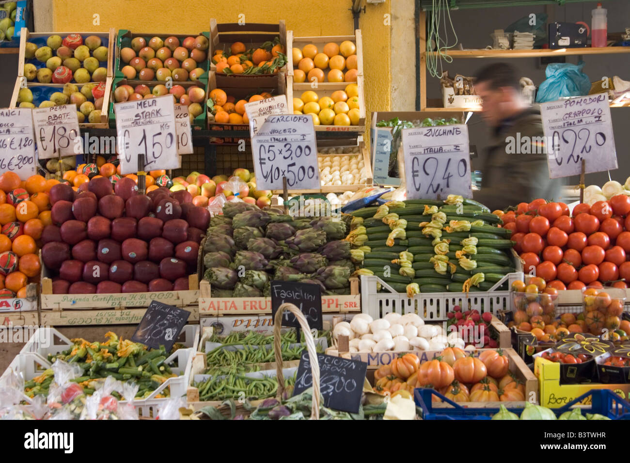 Europe, Italy, Venice. Vegetable and fruit stands on display at market ...