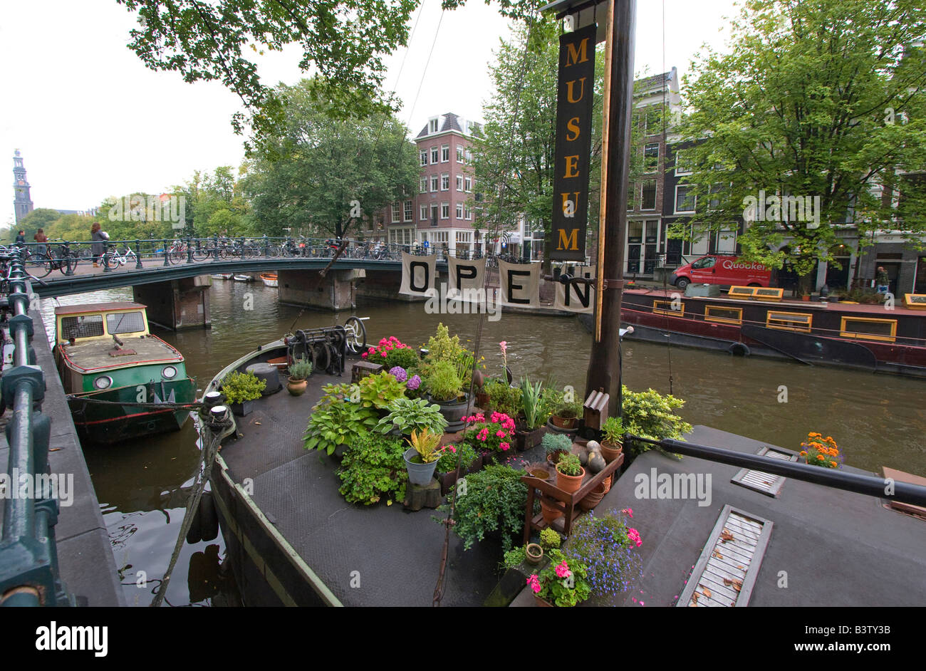 The houseboat museum with colorful plants on a canal Stock Photo - Alamy