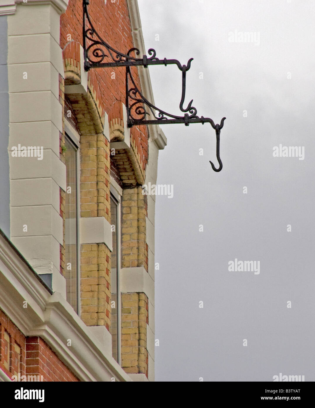 Hooks hanging from brick building in Amsterdam for pully system Stock ...