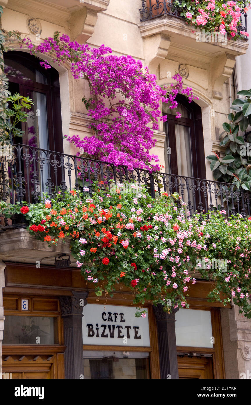 Spain, Bilbao. Flower covered balcony of Cafe Bizvete Stock Photo - Alamy