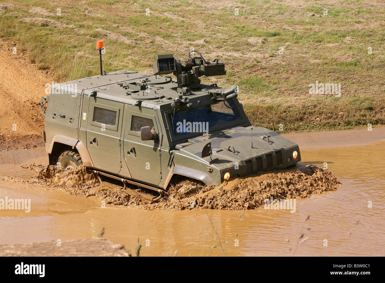 Panther army vehicle going through muddy water Stock Photo - Alamy