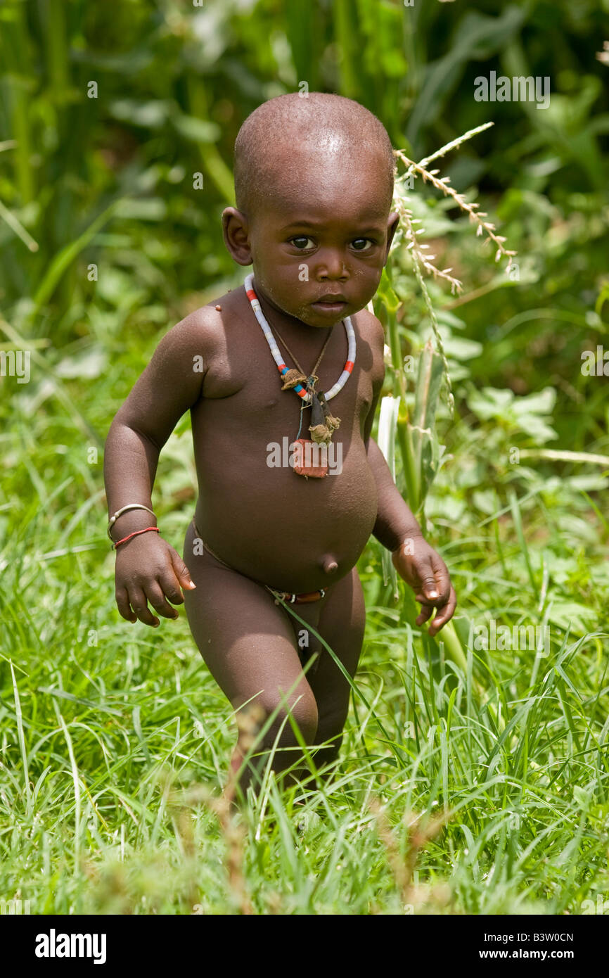 A small tribal boy with an amulet on his chest , Senegal Stock Photo ...
