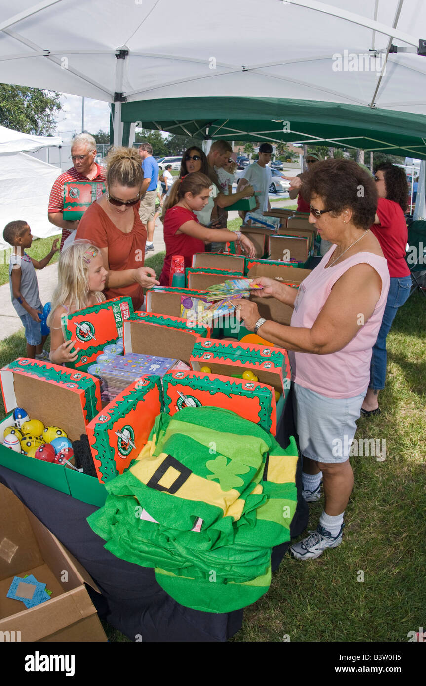 OCC Operation Christmas Child event shoebox collection people putting ...