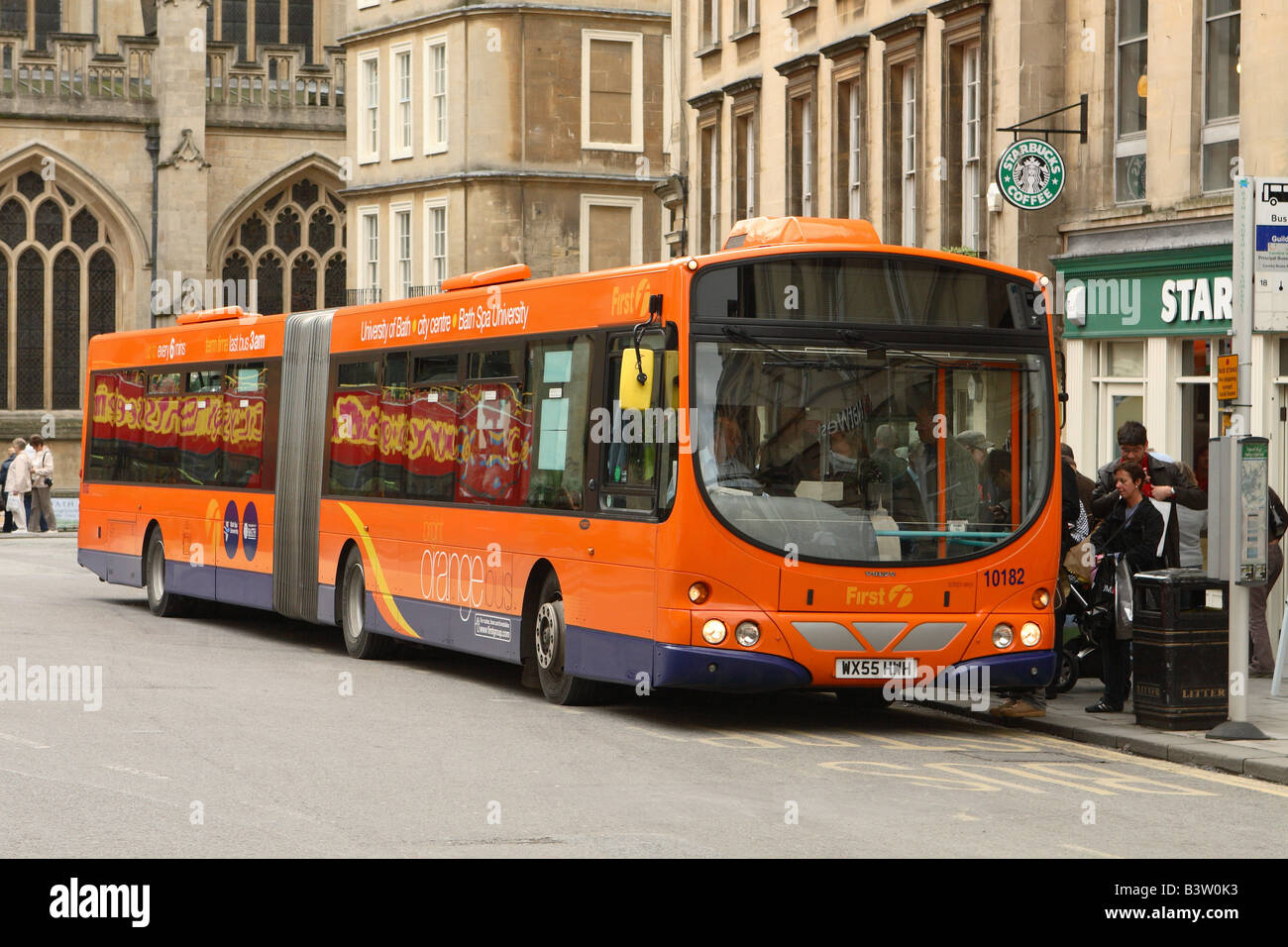 Bath England orange painted bendy bus operated by First Group sponsored ...