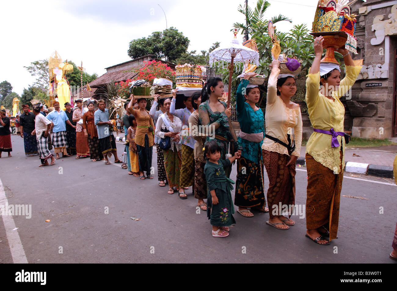 village community life during mass cremation ceremony , ladies with ...