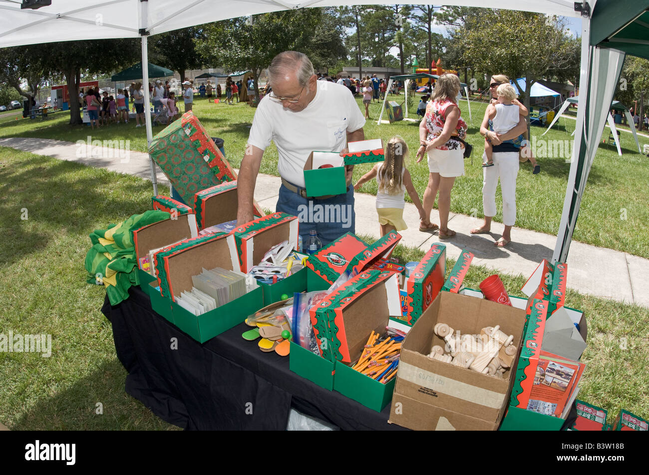 OCC Operation Christmas Child event shoebox collection people putting ...